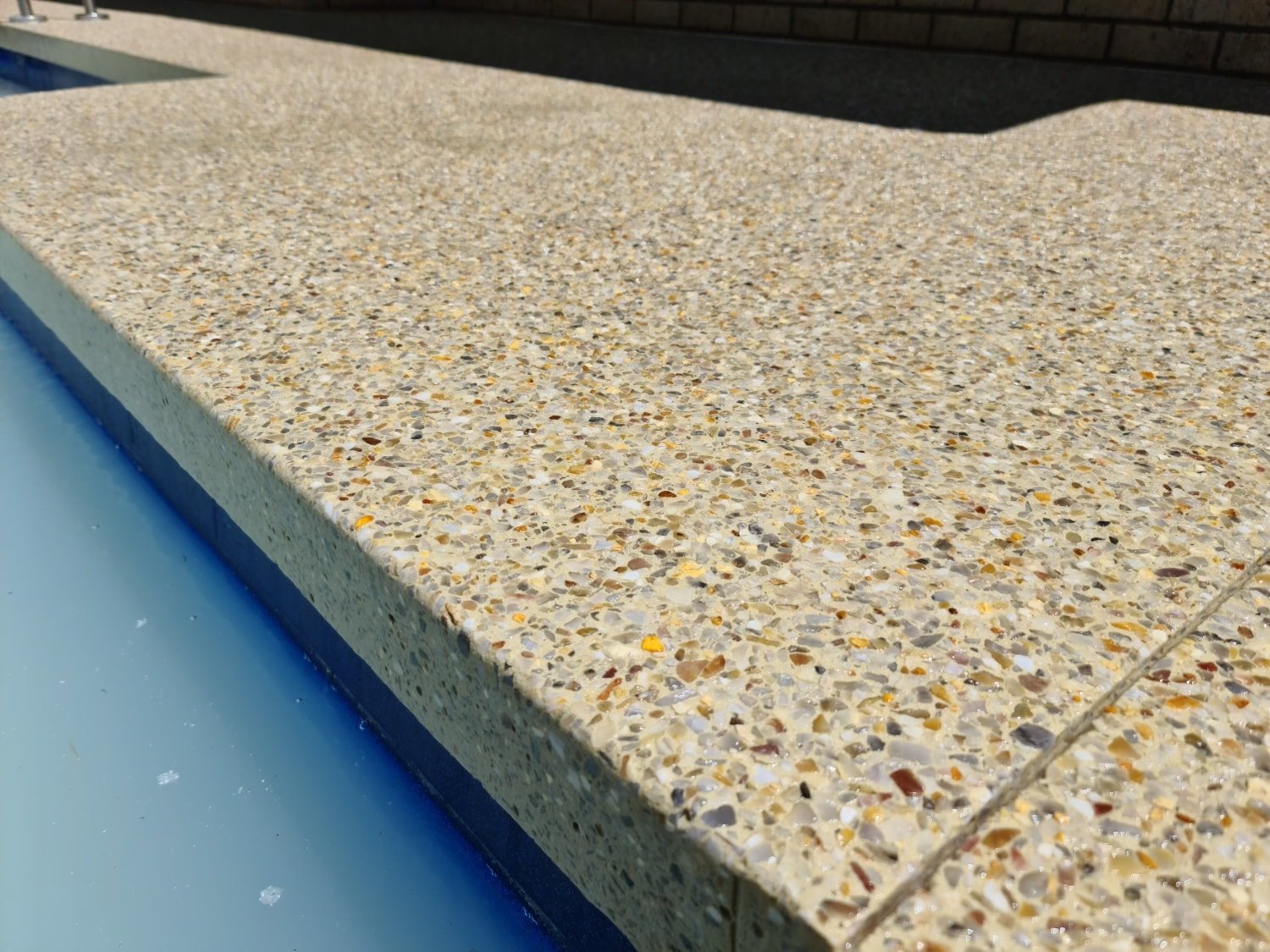 Pool Surround with Seamless Pool Edge - TJD Concrete